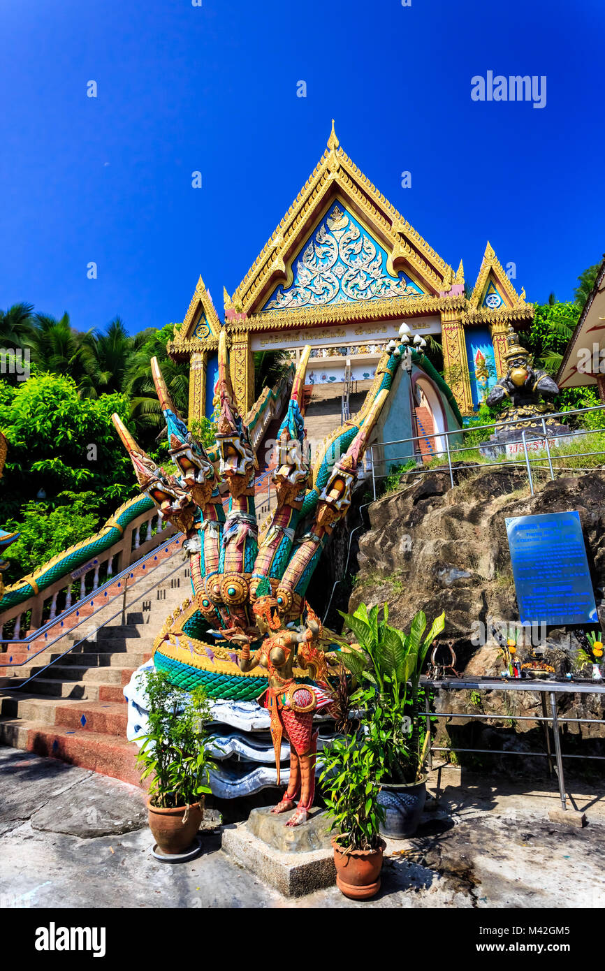 The main stairs leading to Wat Khao Rang temple with boards description ...