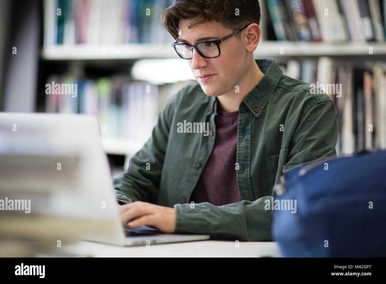College student typing hi-res stock photography and images - Alamy