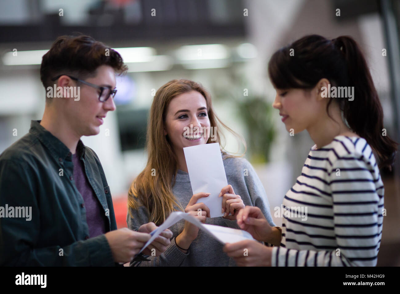 Education smiling exam results hi-res stock photography and images - Alamy