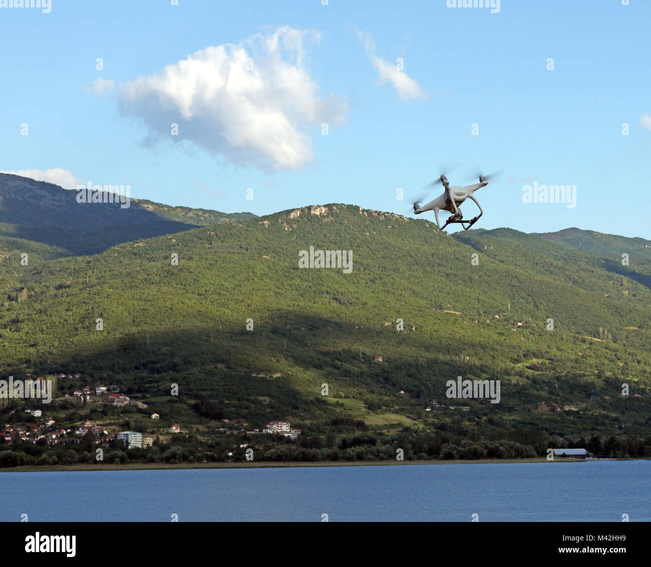 Flying drone over water hi-res stock photography and images - Alamy