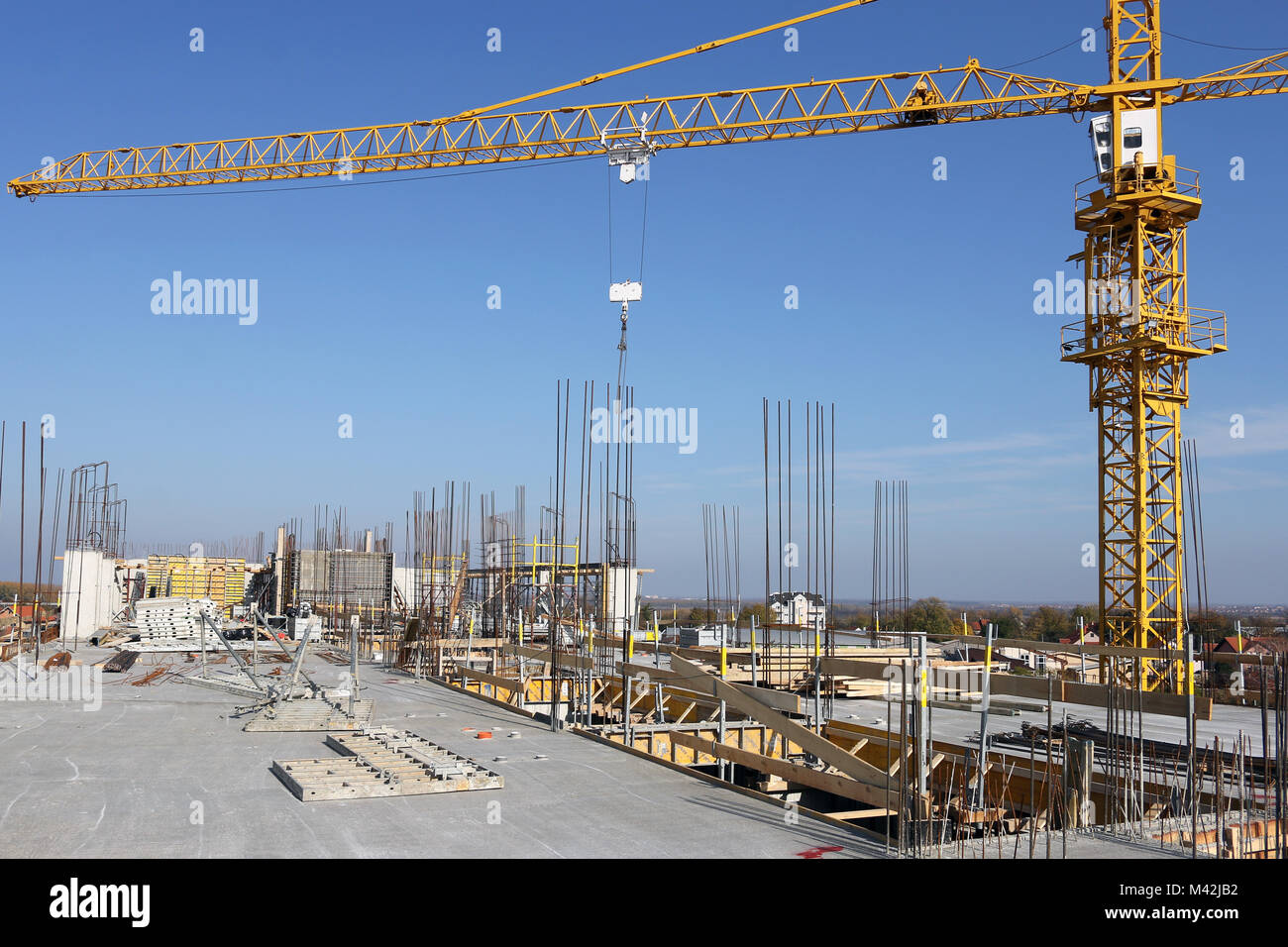crane on construction site industry Stock Photo - Alamy