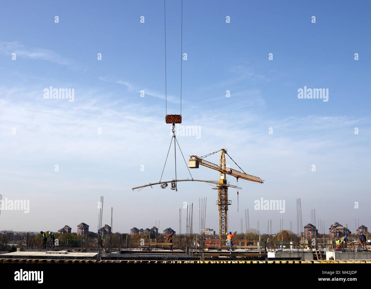 Scaffolding construction workers crane development hi-res stock ...