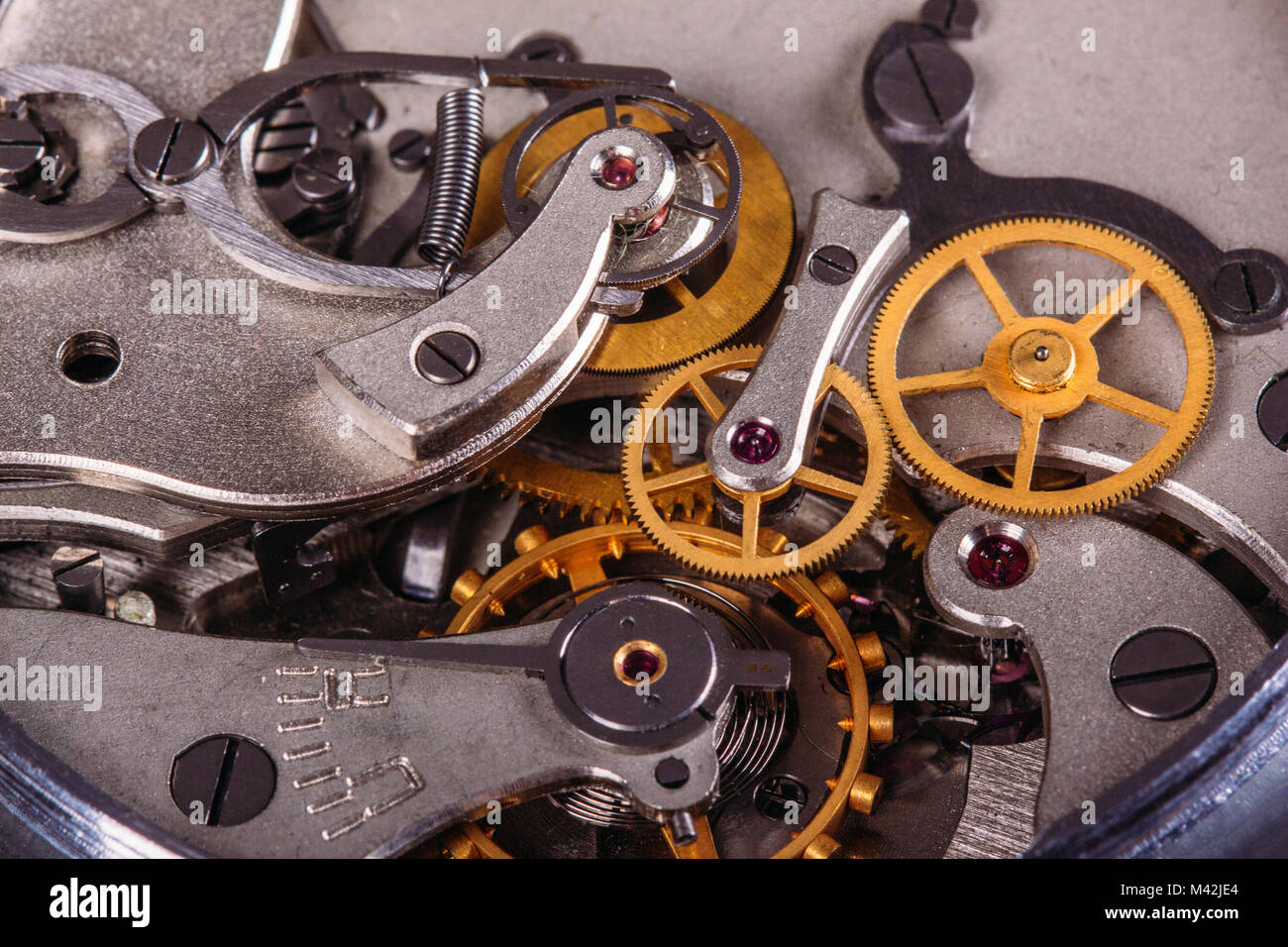 Gears of the clock close-up. Old Soviet Stopwatch Stock Photo - Alamy