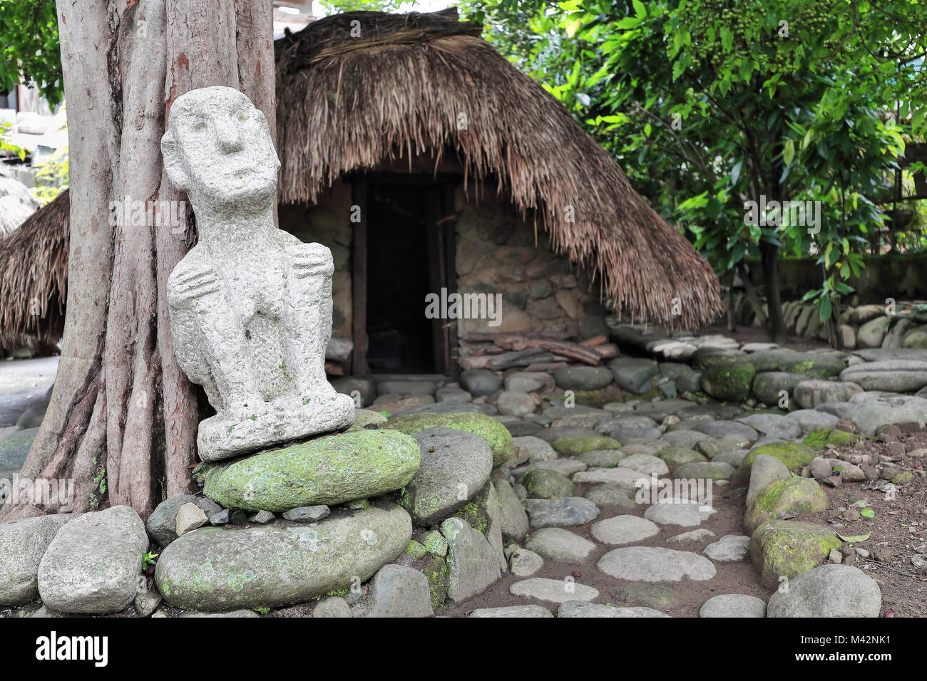 Bulul idol-ulog communal thatched sleeping hut for young girls in a ...