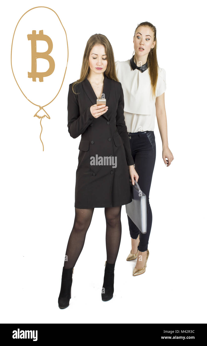 Beautiful women standing over white background with bitcoin sketches ...