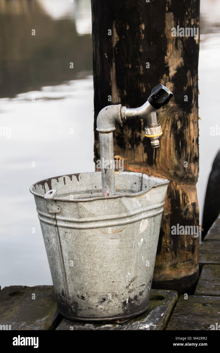 Pole water bucket hi-res stock photography and images - Alamy