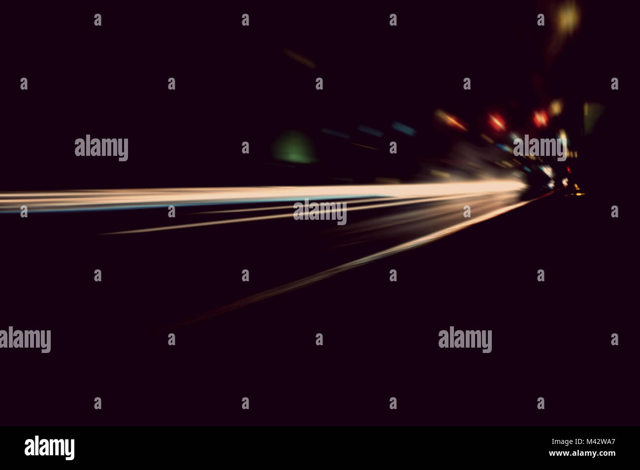 Blurry Illumination and night lights, car traffic motion blur the speed ...