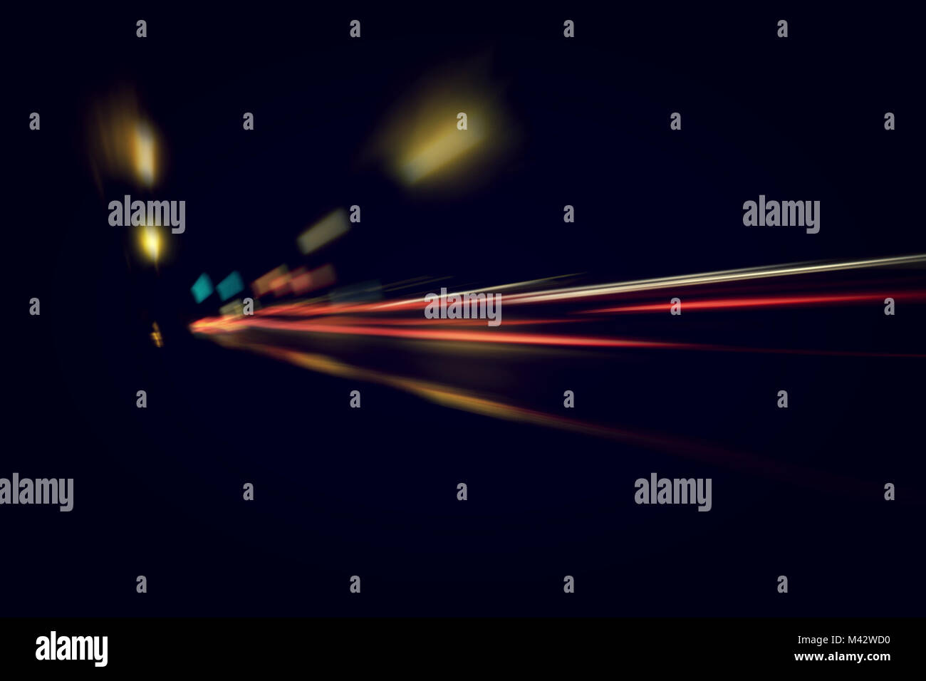Blurry Illumination and night lights, car traffic motion blur the speed ...