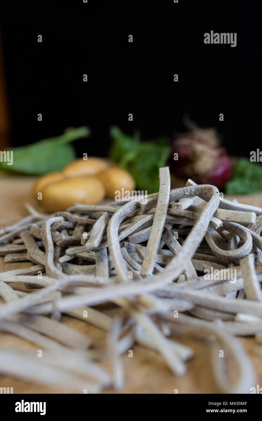 Ingredients for Pizzoccheri a flat ribbon pasta cooked with Savoy ...