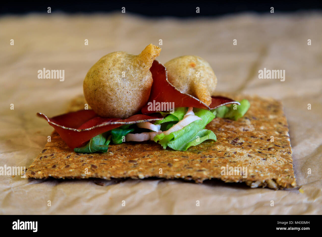 Valtellina typical dish and appetizer consisting in Sciatt with ...
