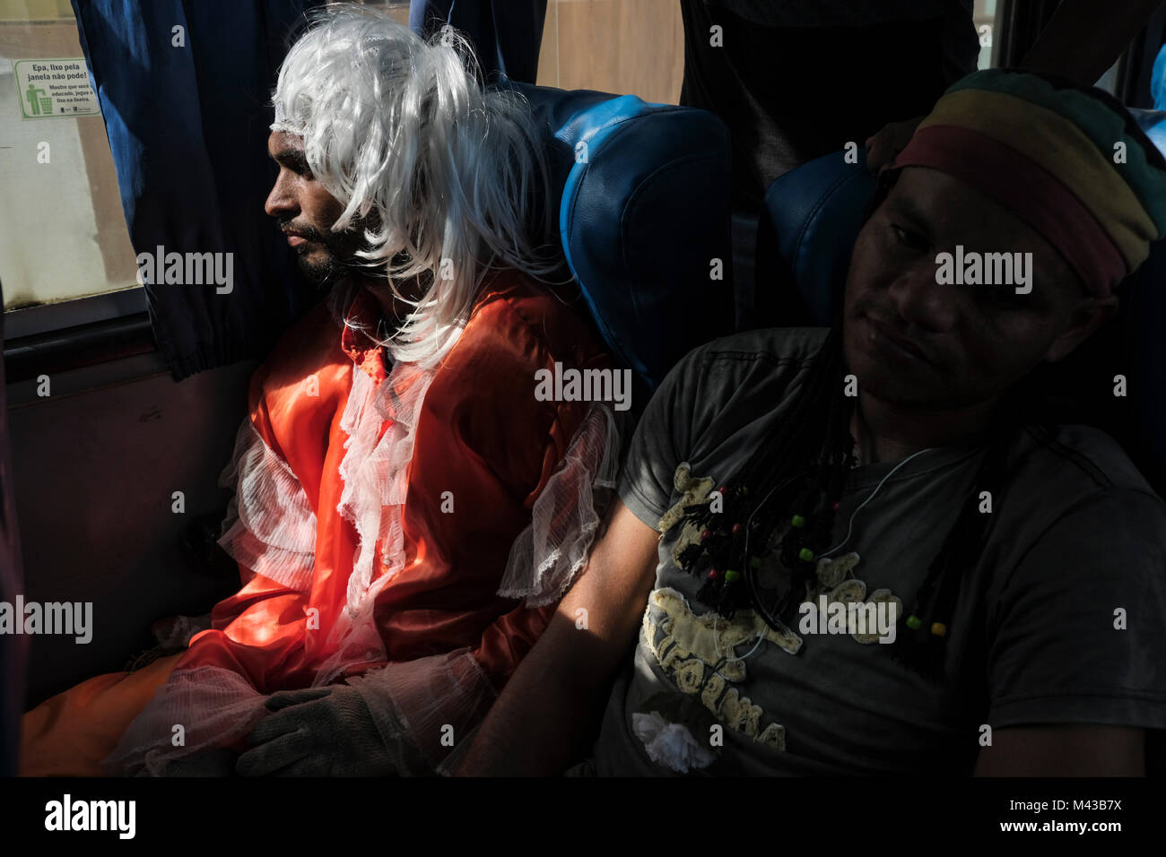 Two members of a Maracatu group taking a break after a carnival parade ...