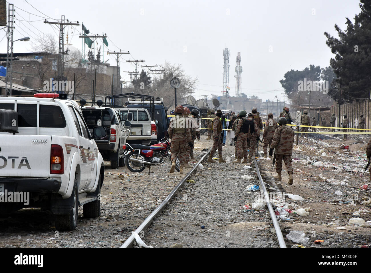 Quetta. 14th Feb, 2018. Security officials inspect the attack site in ...