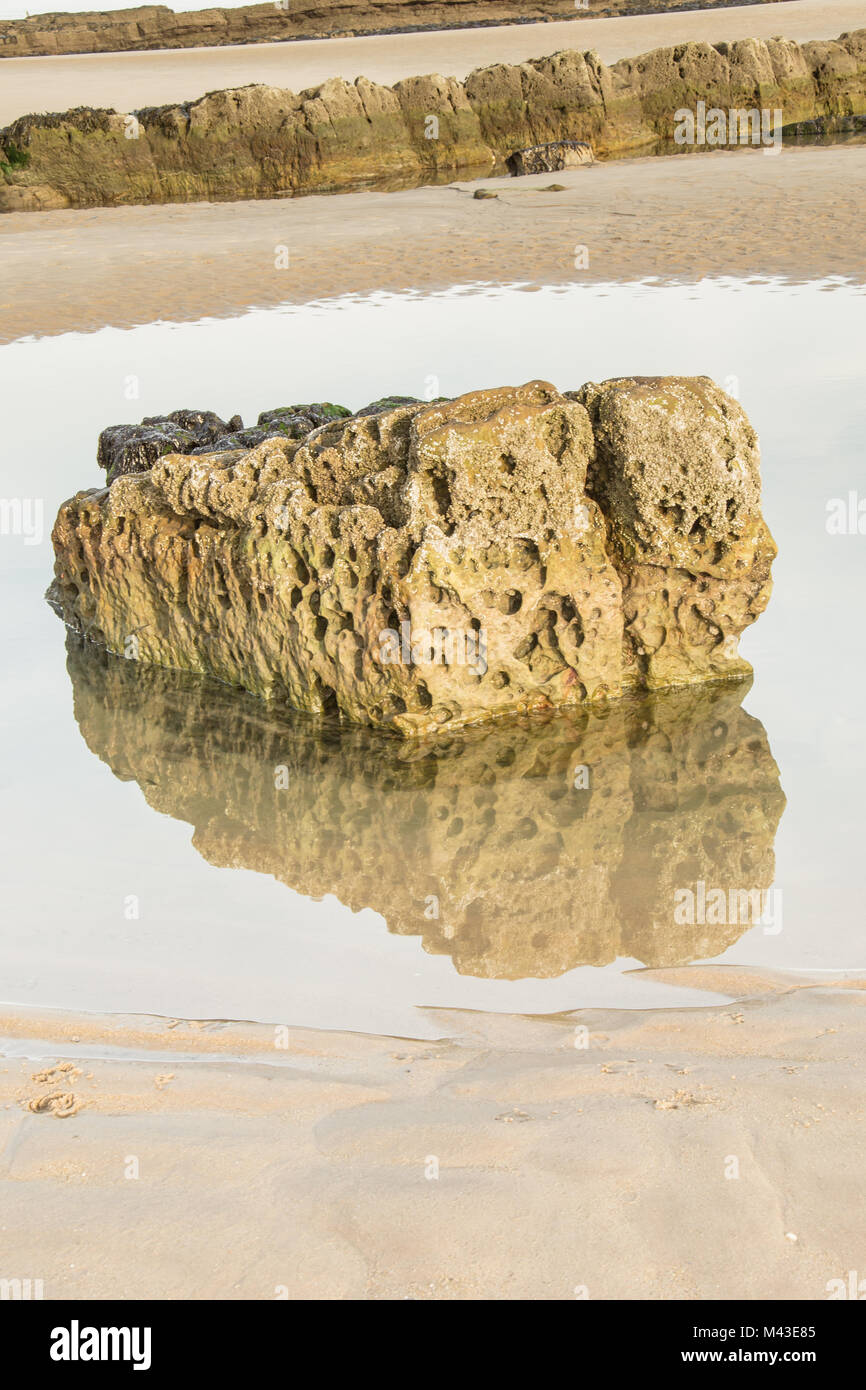Rock Reflection in Water Stock Photo - Alamy
