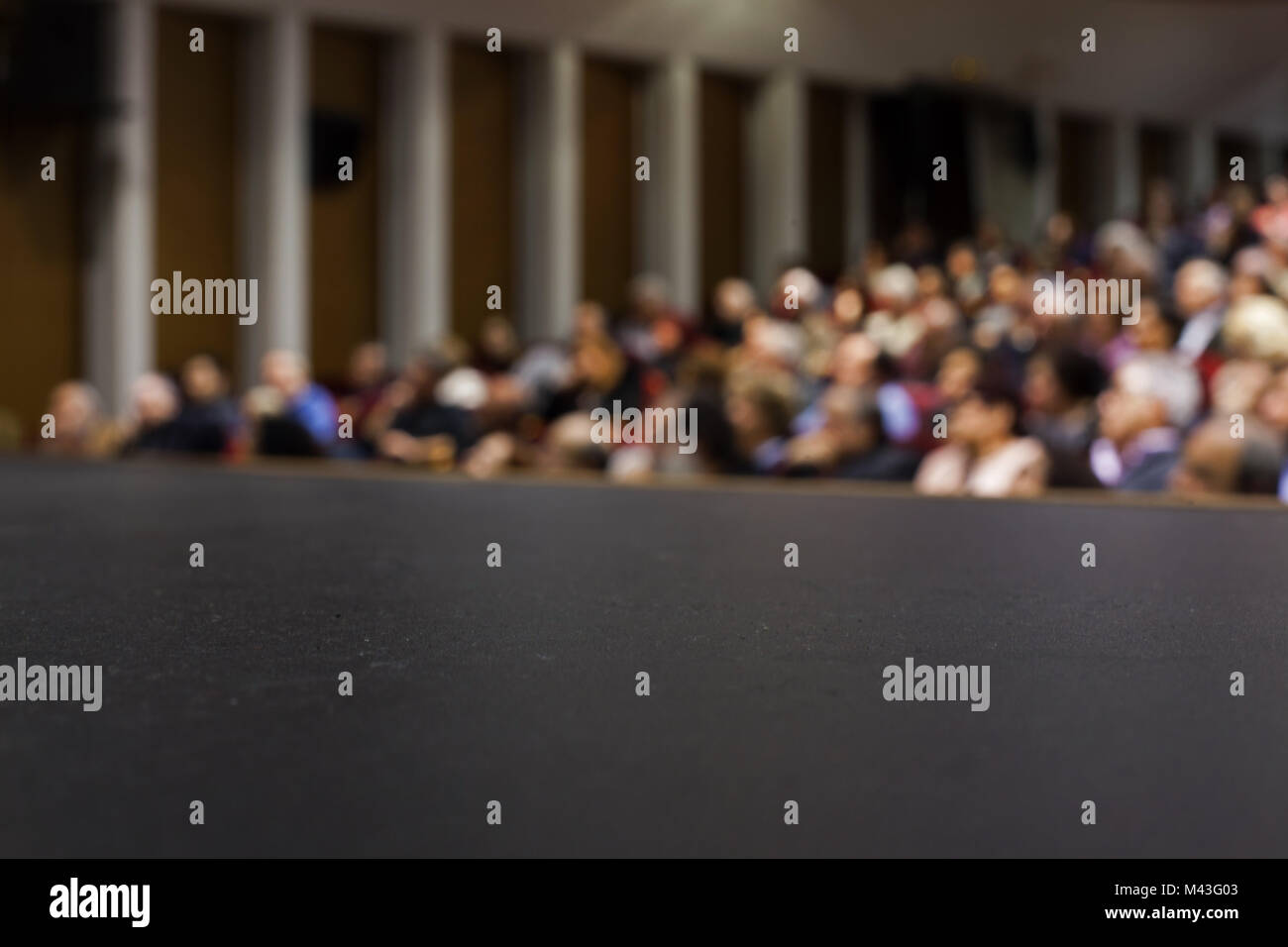 Crowd attending a music conference in a theatre Stock Photo - Alamy