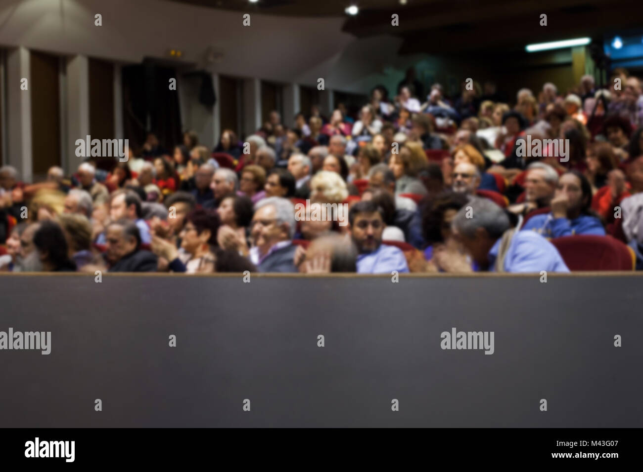 Crowd attending a music conference in a theatre Stock Photo - Alamy