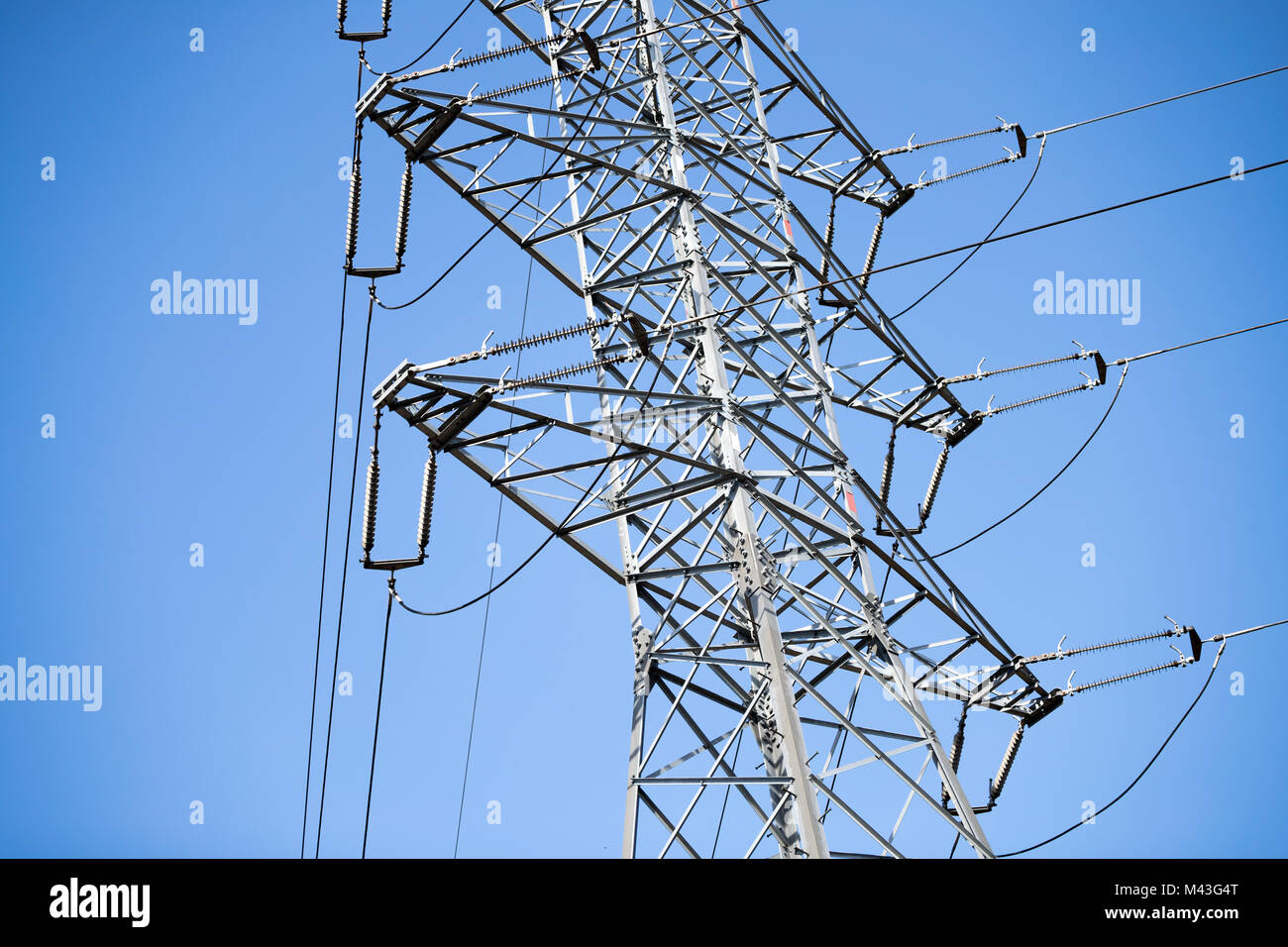 Picture of transmission line tower on blue sky Stock Photo - Alamy