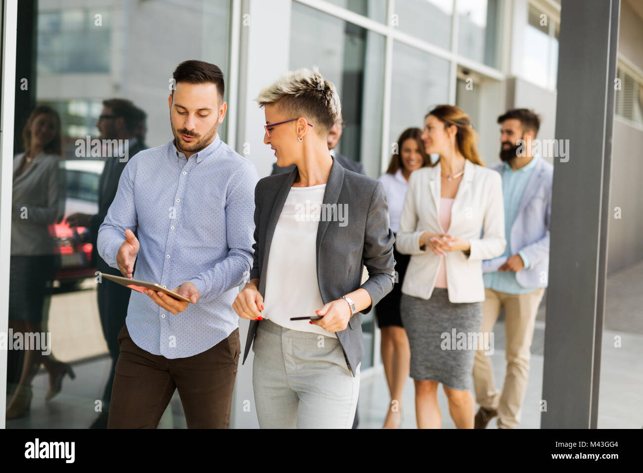 Picture of business people discussing in their company Stock Photo - Alamy