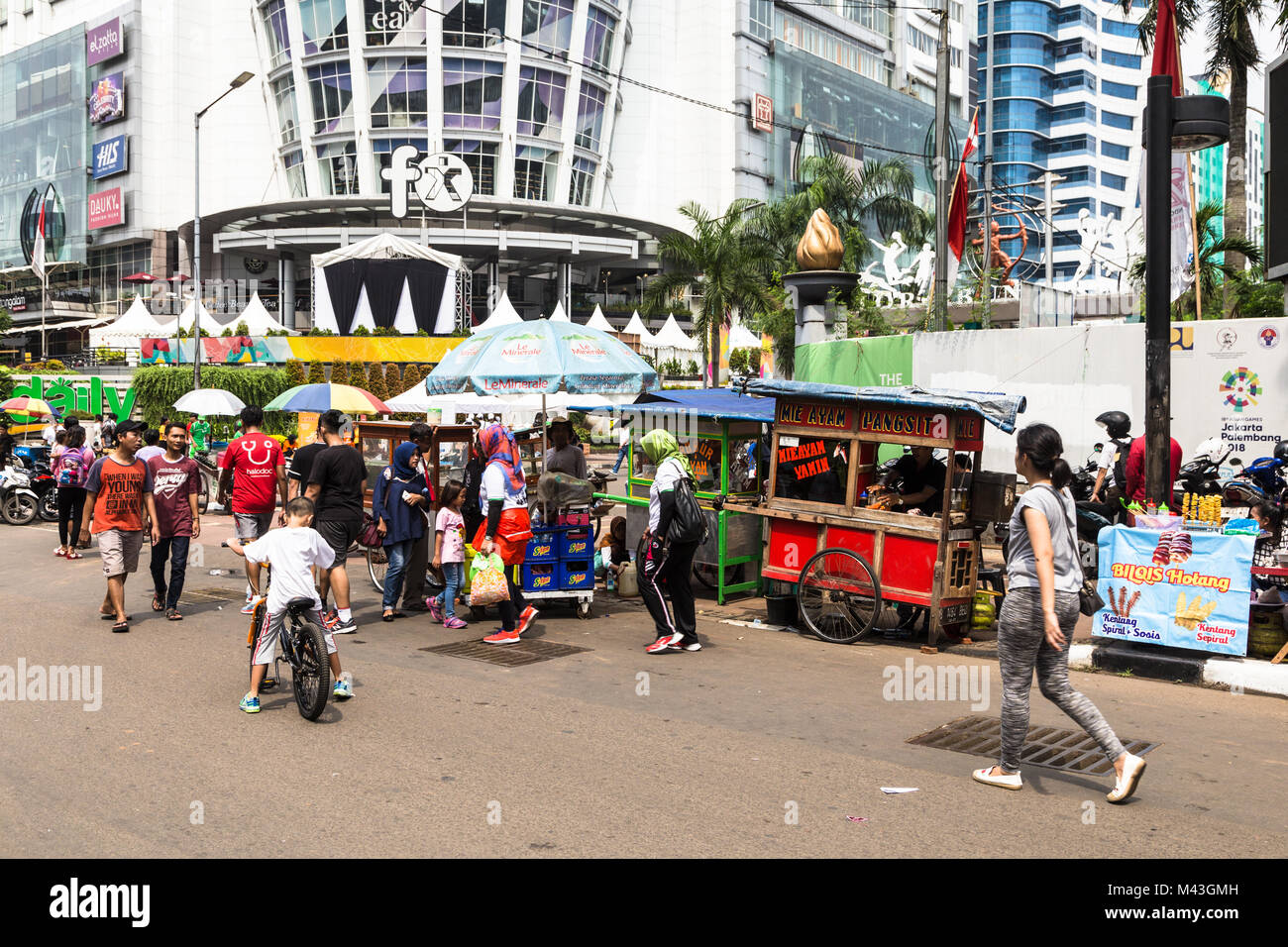 Jakarta, Indonesia - October 27 2017: People enjoy the traffic free streets of Jakarta on every ...