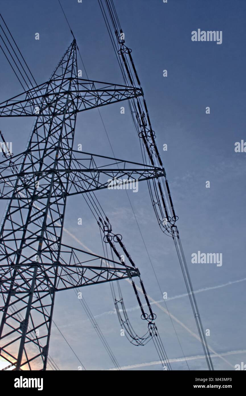 pylon in front of blue sky Stock Photo - Alamy