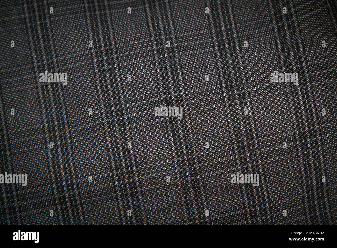 gray fabric in a cage close up Stock Photo - Alamy