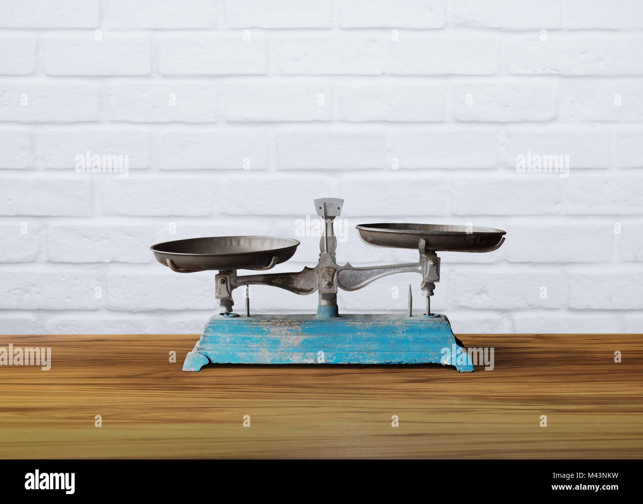 old vintage weight scale on wooden table, justice symbol Stock Photo ...