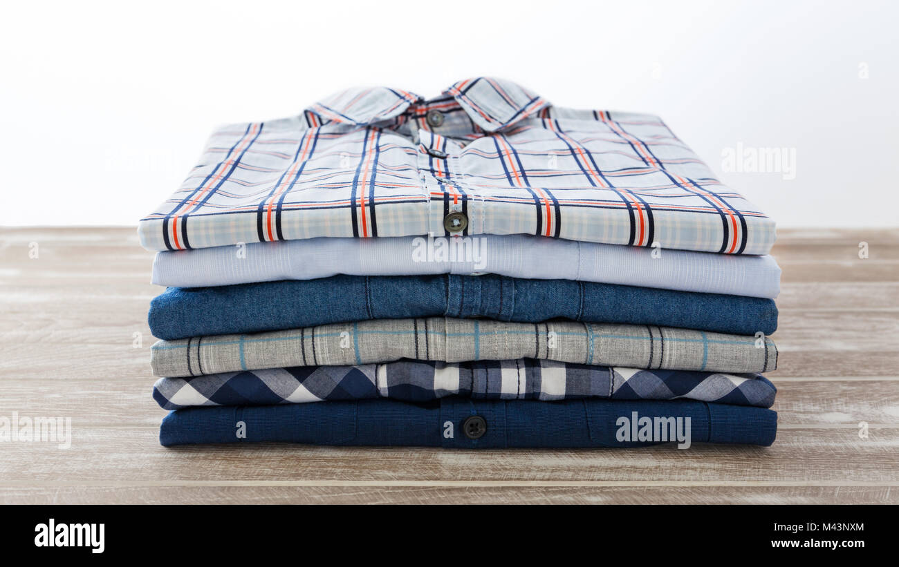 Folded shirt stack hi-res stock photography and images - Alamy