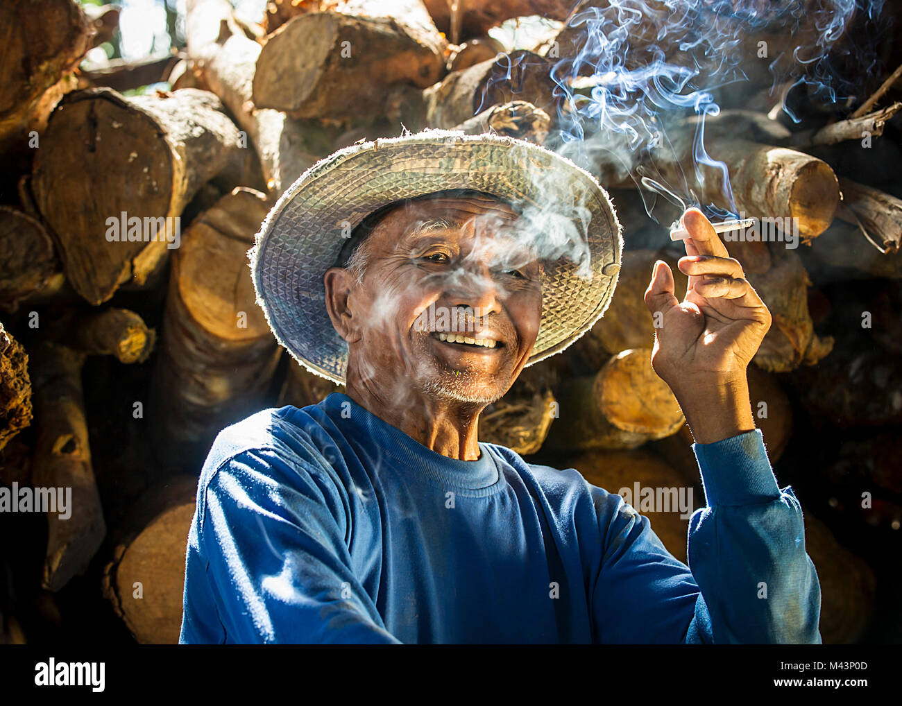 Old men smoking at brick factory Stock Photo - Alamy