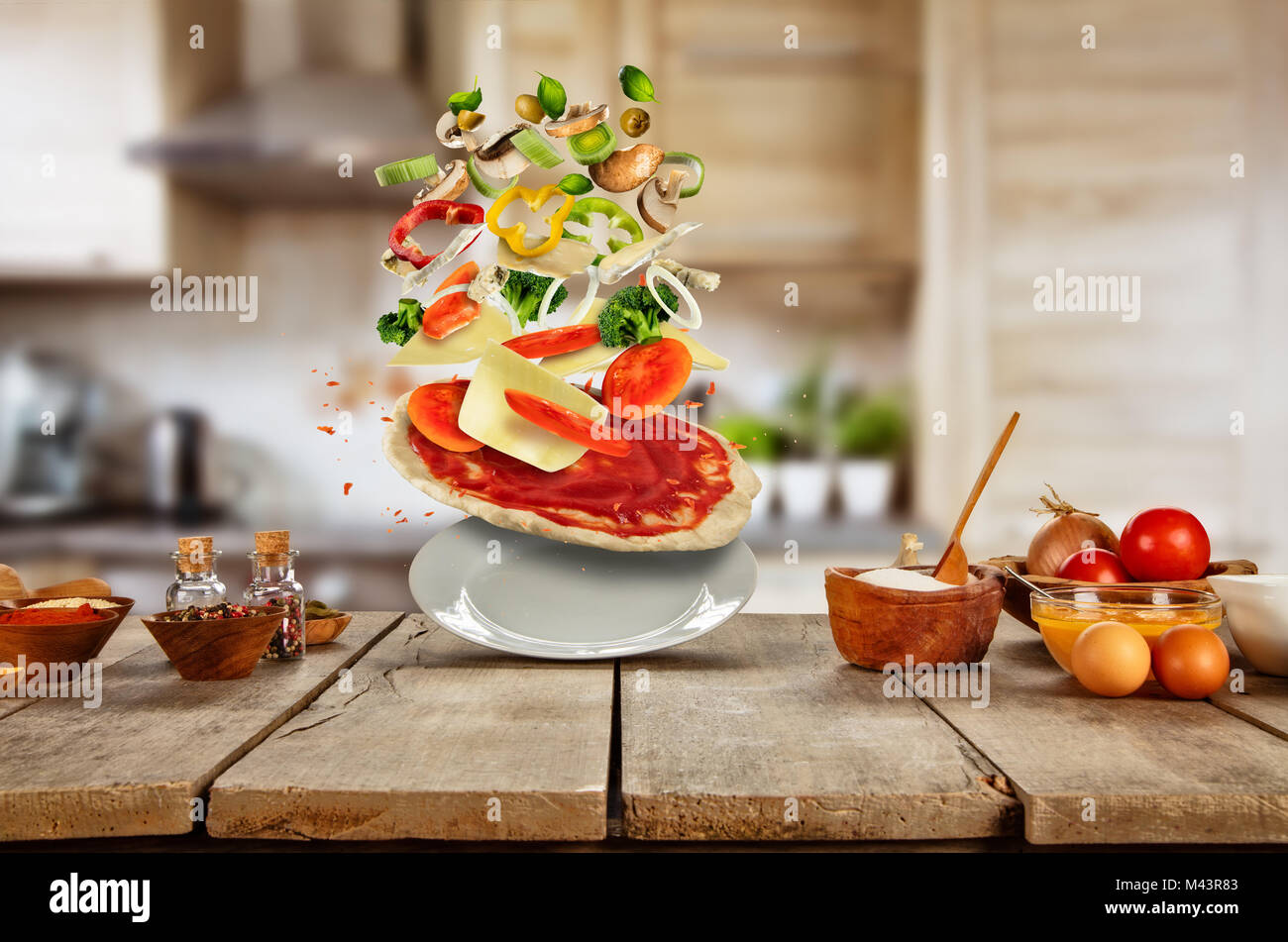 Flying food ingredients with pizza. Concept of italian kitchen and ...