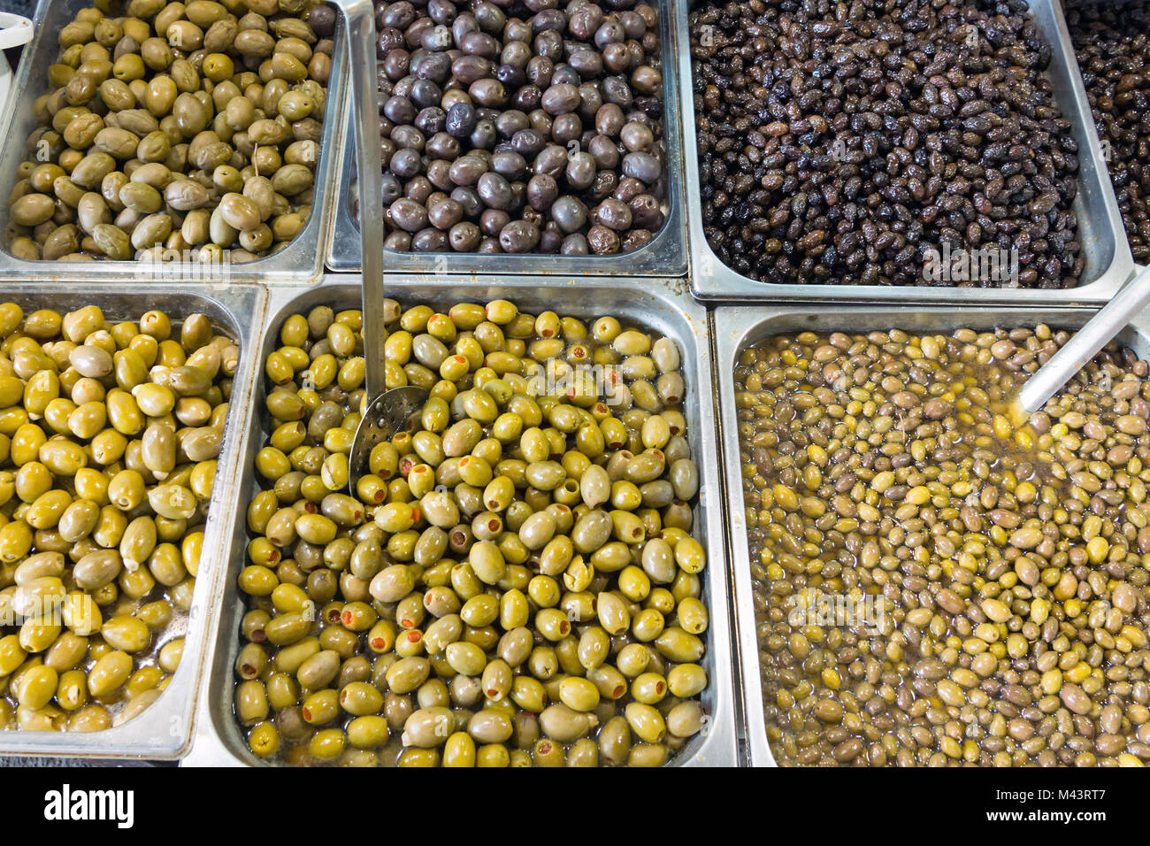 A selection of olives for sale at a market Stock Photo - Alamy