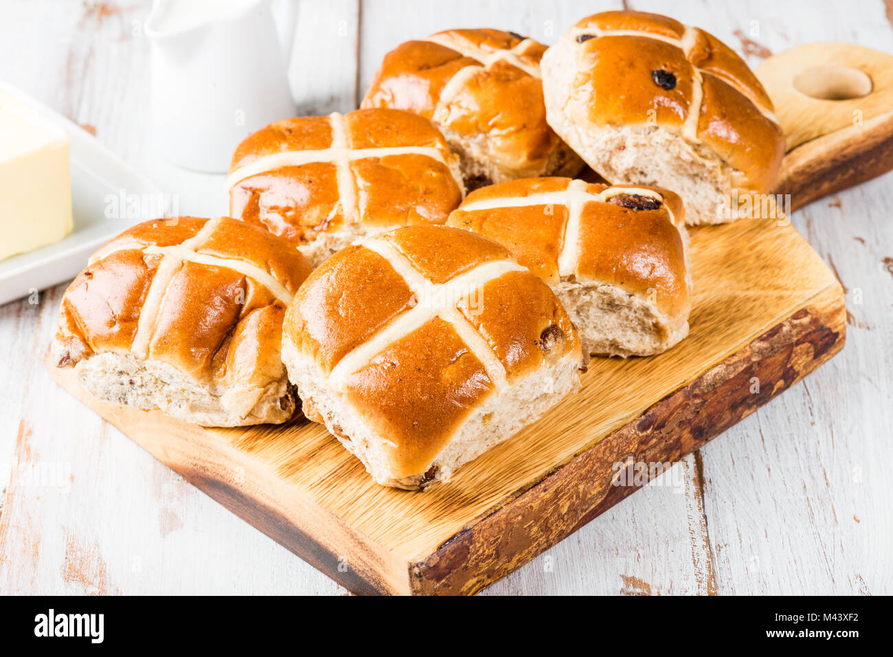 Easter Breakfast with Hot Cross Buns, served on Wooden Chopping Board ...
