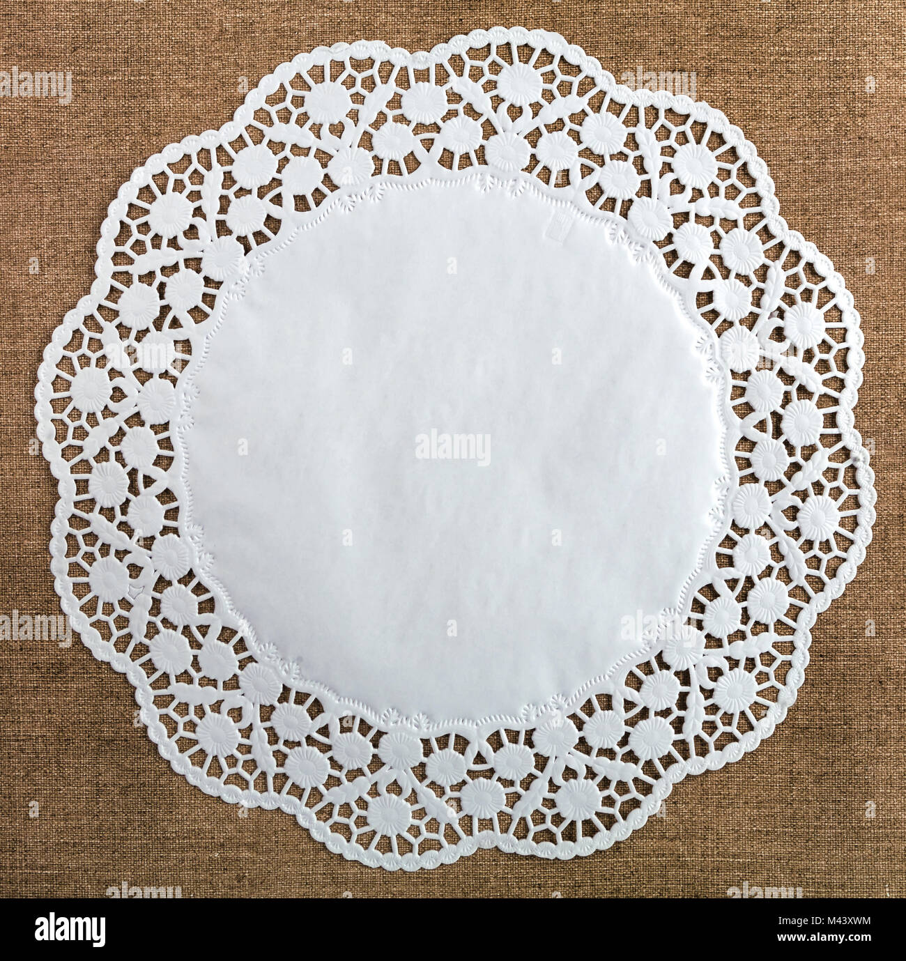 Beautiful decorative Lace Dolly on bright background Stock Photo - Alamy