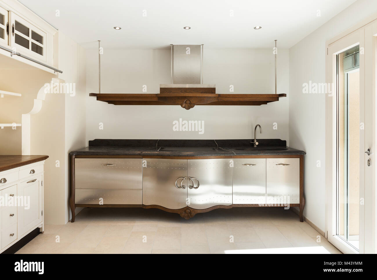 Interior of a new empty house, classic kitchen Stock Photo - Alamy