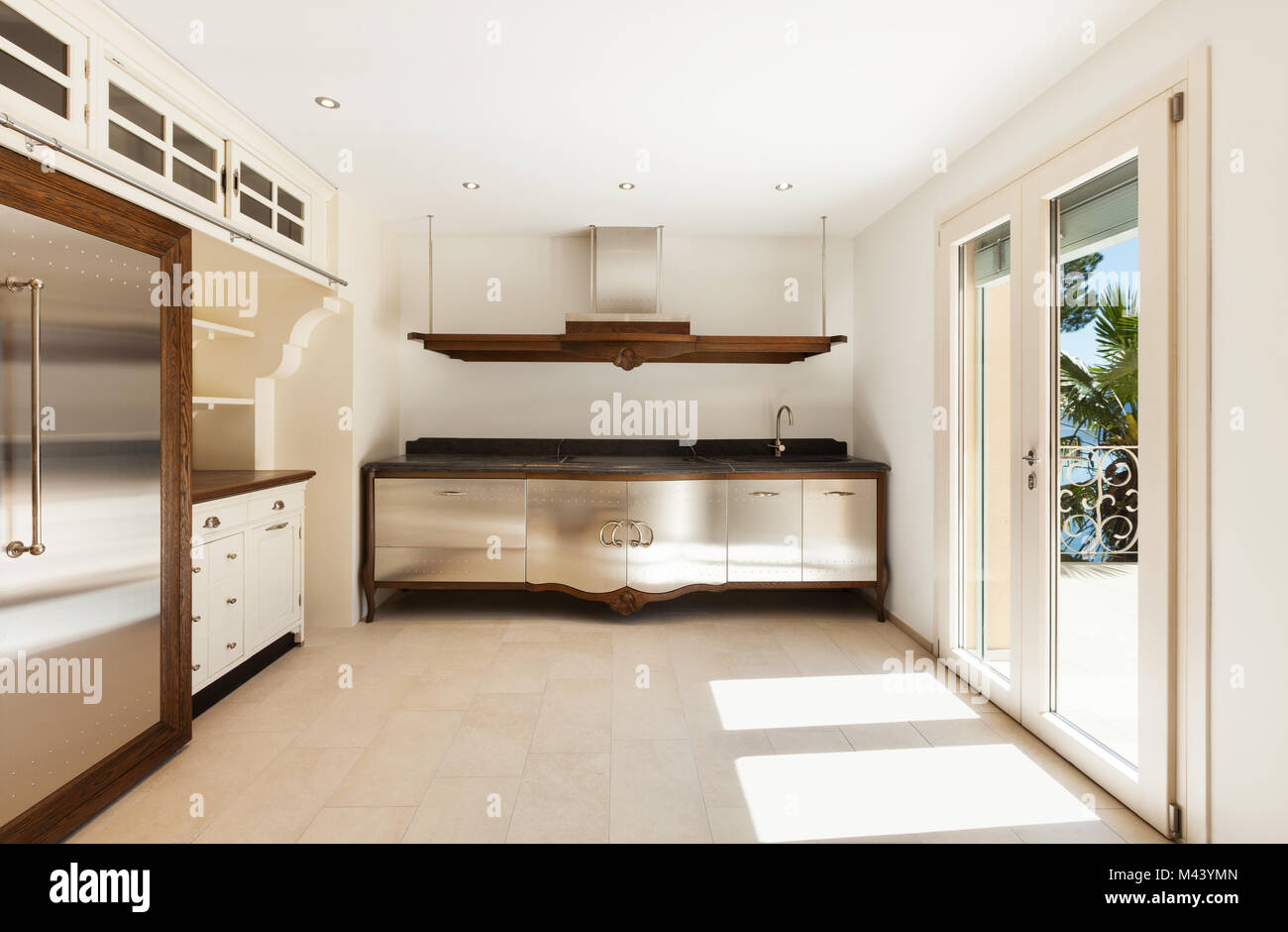 Interior of a new empty house, classic kitchen Stock Photo - Alamy