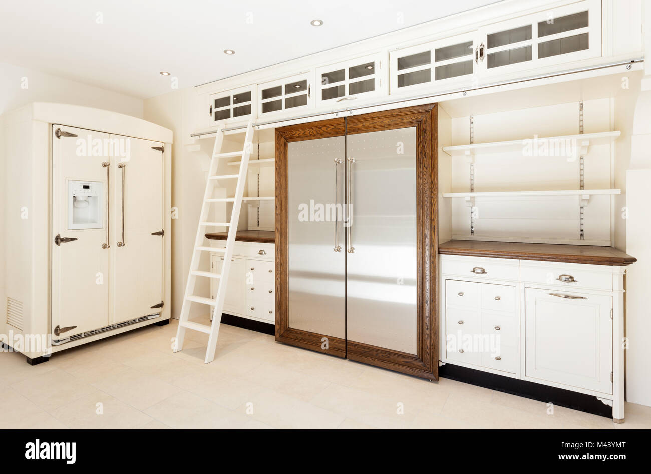 Interior of a new empty house, classic kitchen Stock Photo - Alamy