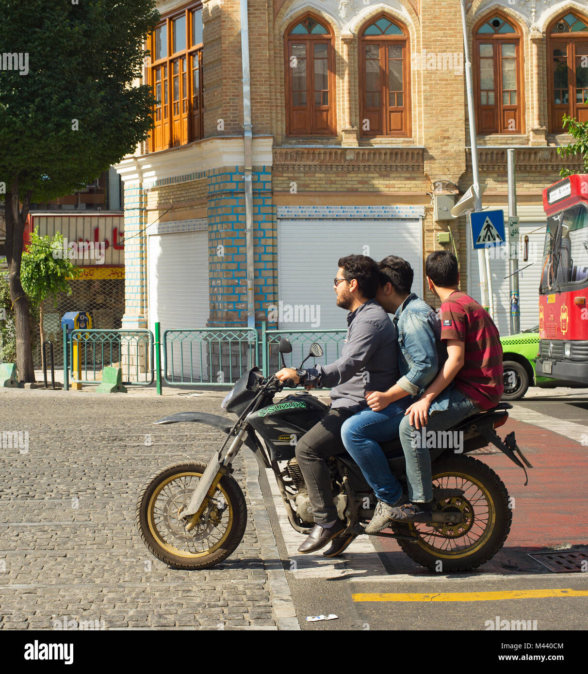TEHRAN, IRAN - MAY 19, 2017: Men riding motorcycle on Tehran street ...
