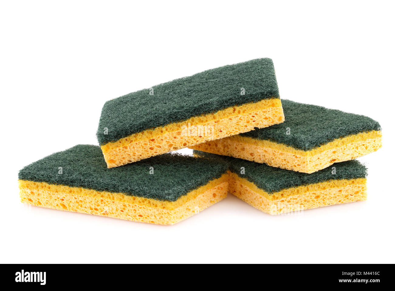 Pile of sponges isolated on white background Stock Photo - Alamy
