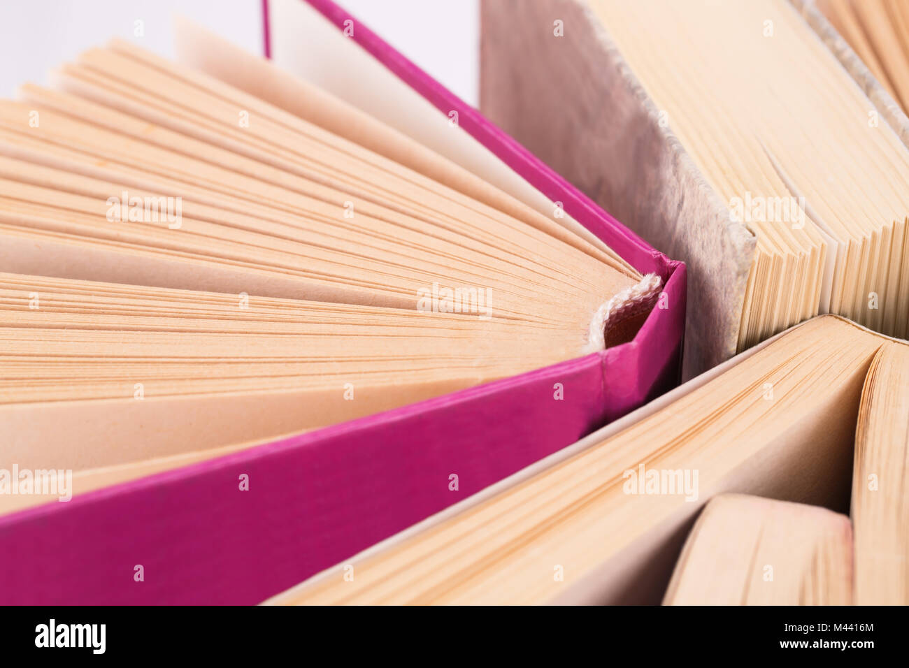 Opened books close up picture Stock Photo - Alamy