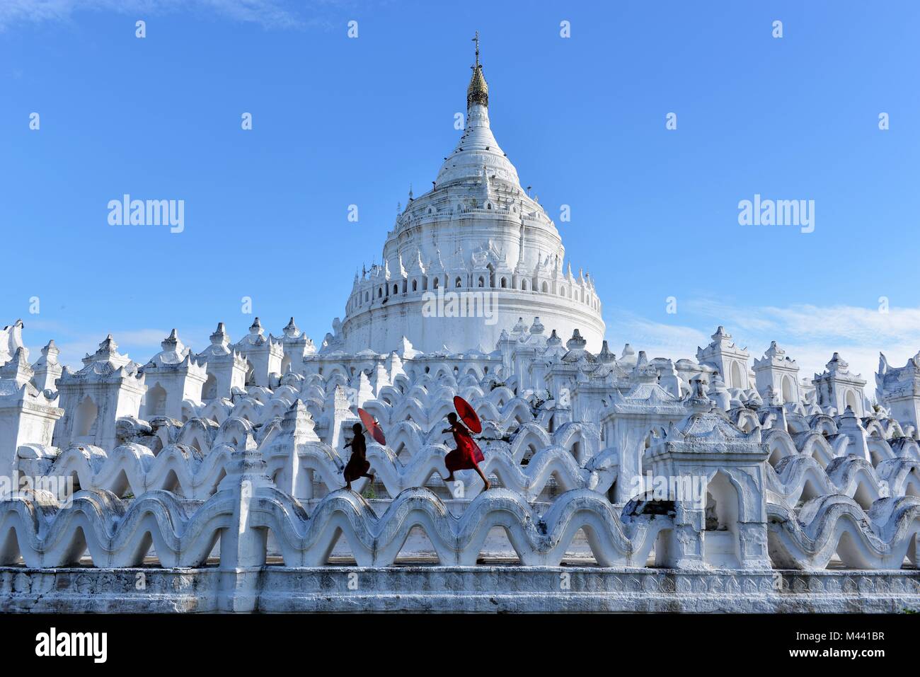Buddhist monks with umbrellas hi-res stock photography and images - Alamy