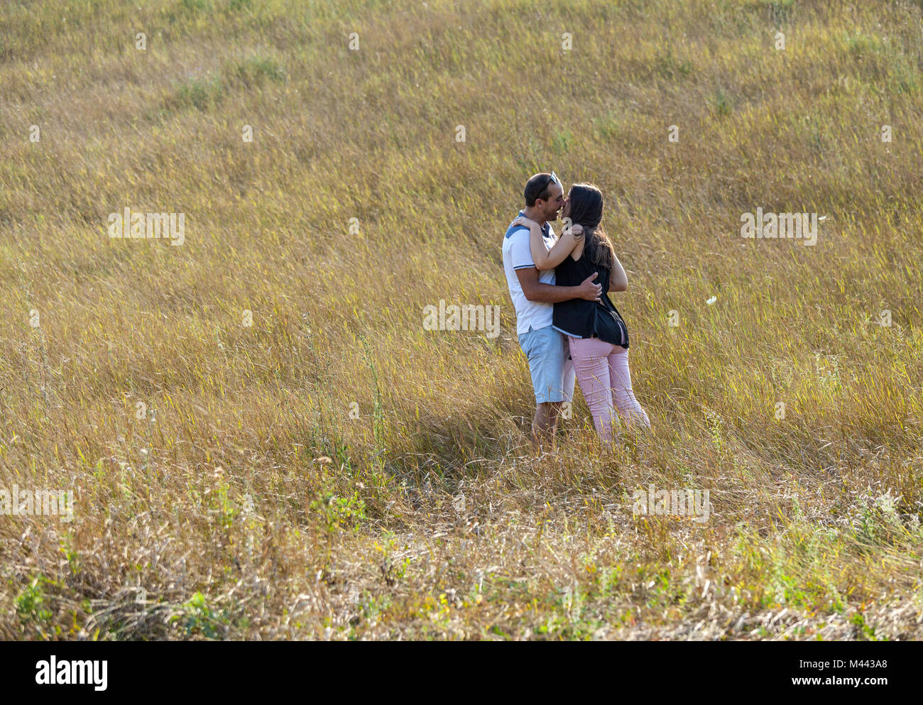 lonely and young couple in love on a trip in a nature reserve. Abruzzo ...