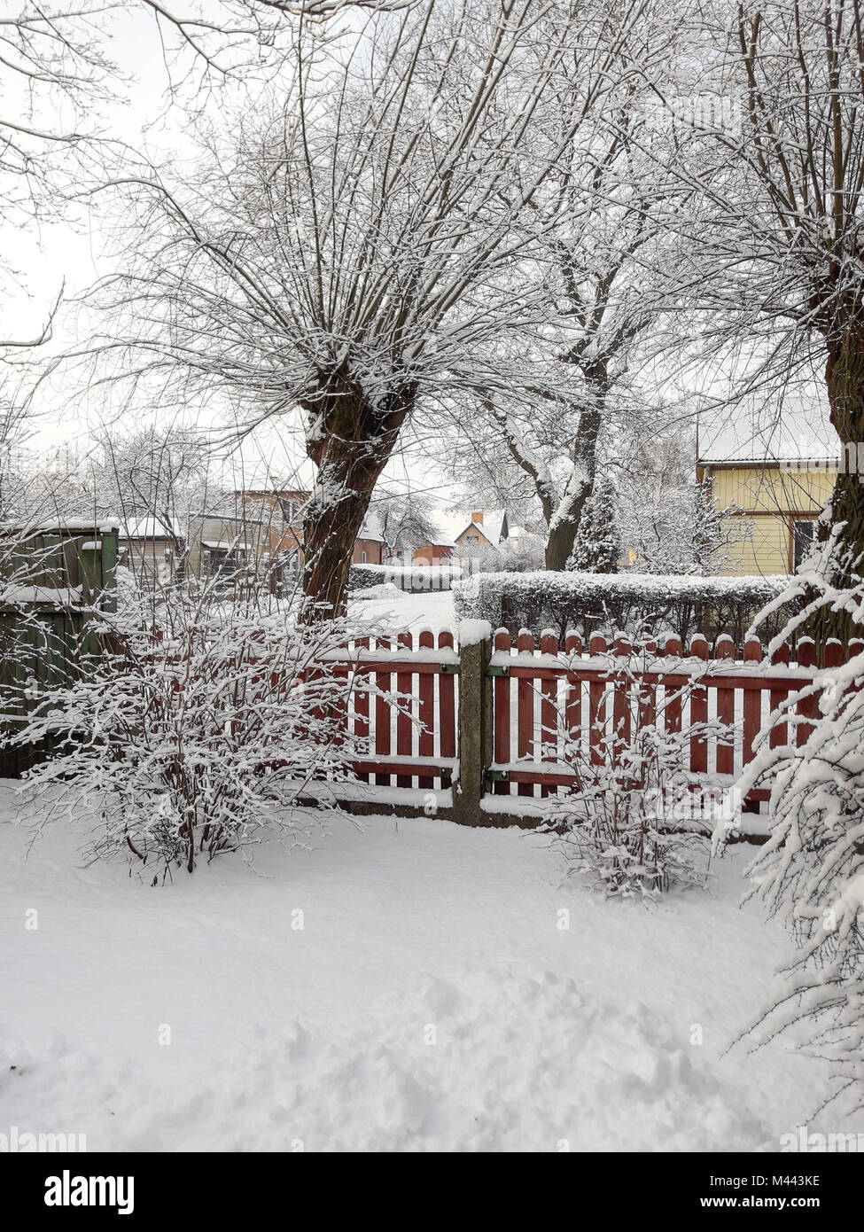 First snow in suburban area. Beautiful winter scene with white snowbank ...