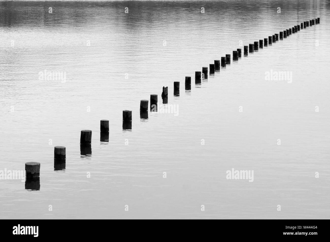 Posts in lake Stock Photo - Alamy