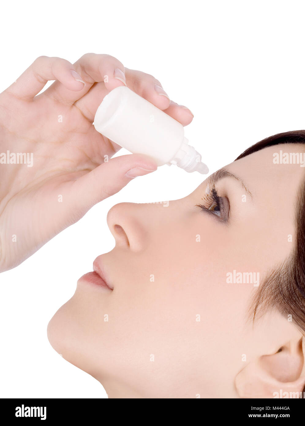 woman dripping eye with eyes drops Stock Photo - Alamy
