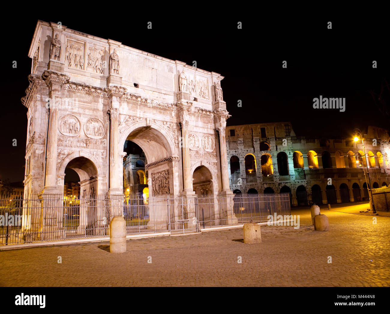 ancient Colosseum and Triumphal arch. Rome. Italy Stock Photo - Alamy
