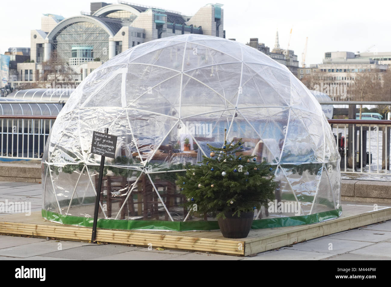 igloo-style PVC party-domes on the banks of the Thames London Stock ...
