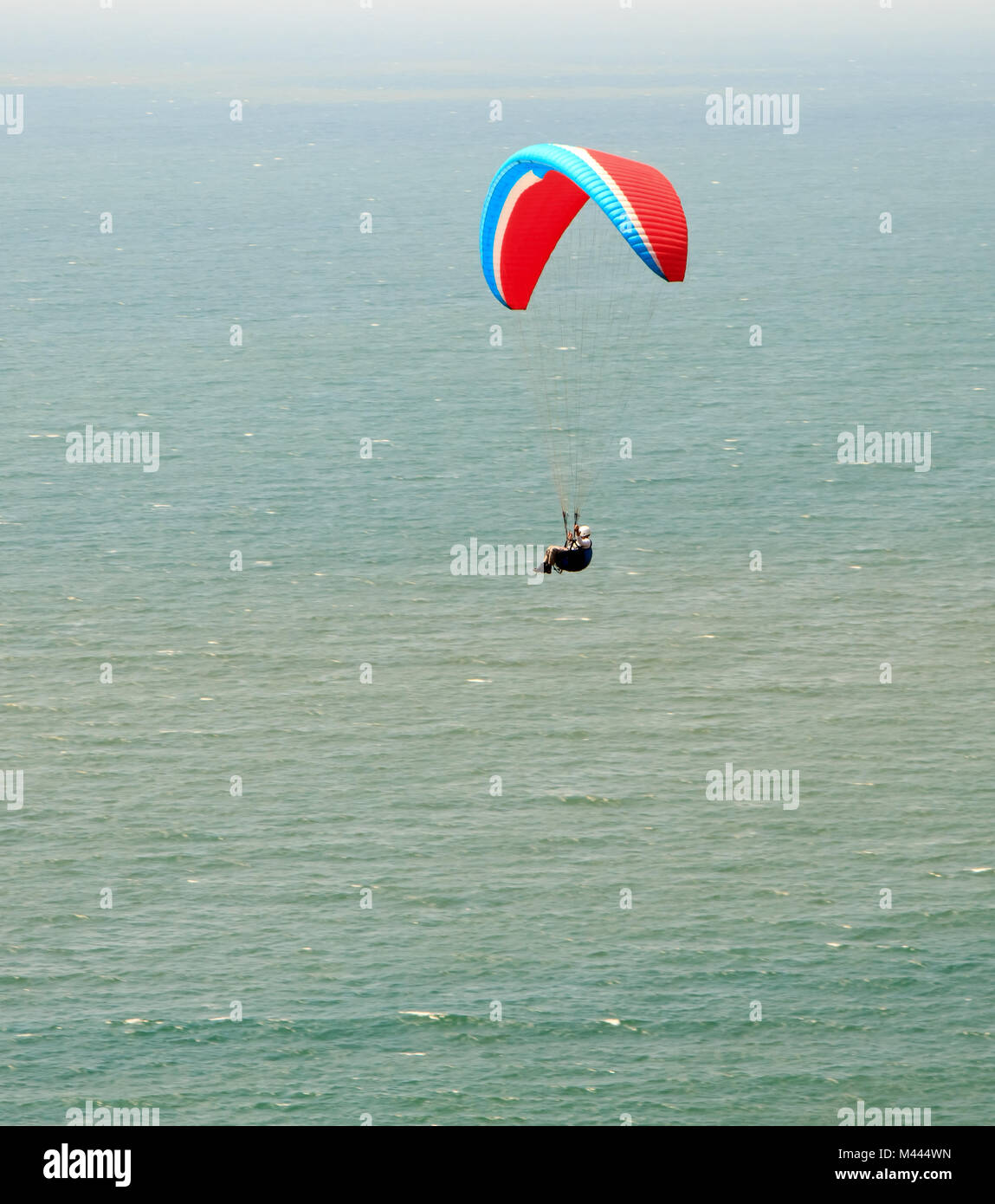 Paraplane flight. Paraplane flight over the sea Stock Photo - Alamy