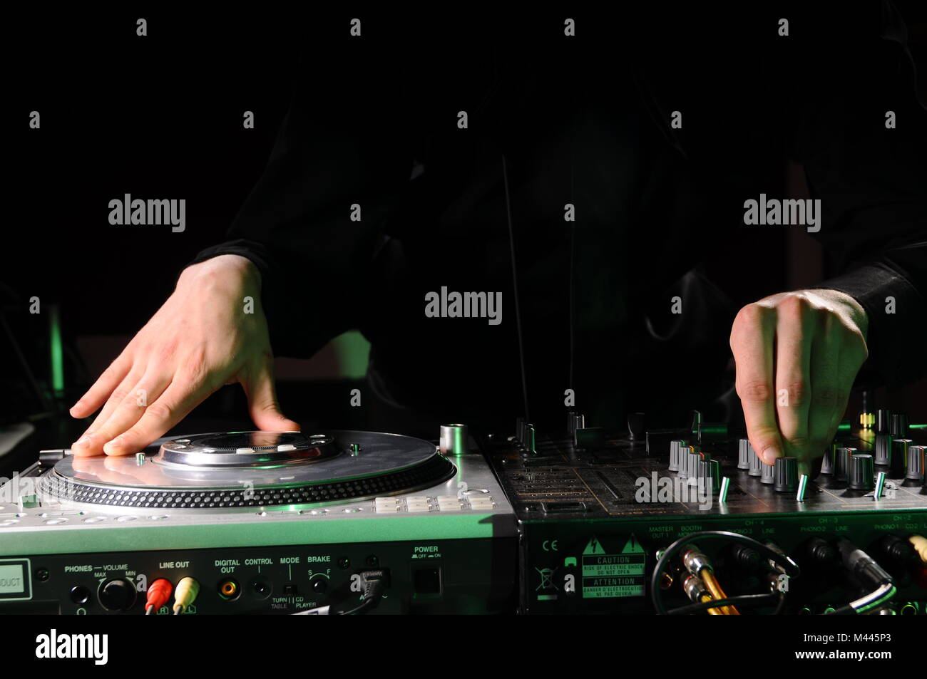 Dj playing music and people dancing hi-res stock photography and images ...