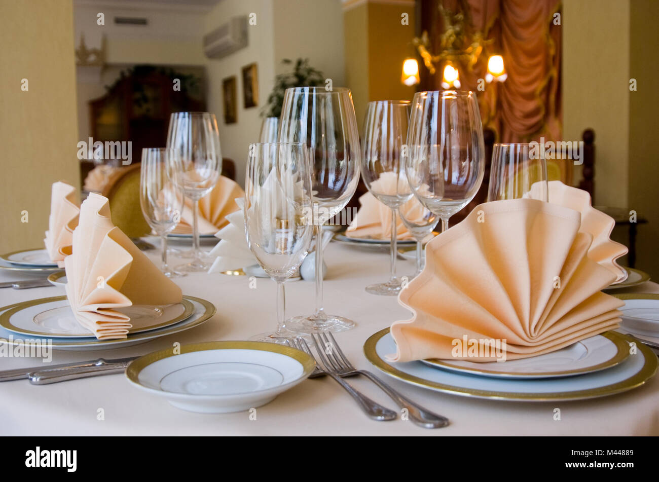 Table setting with plate and a napkin Stock Photo - Alamy