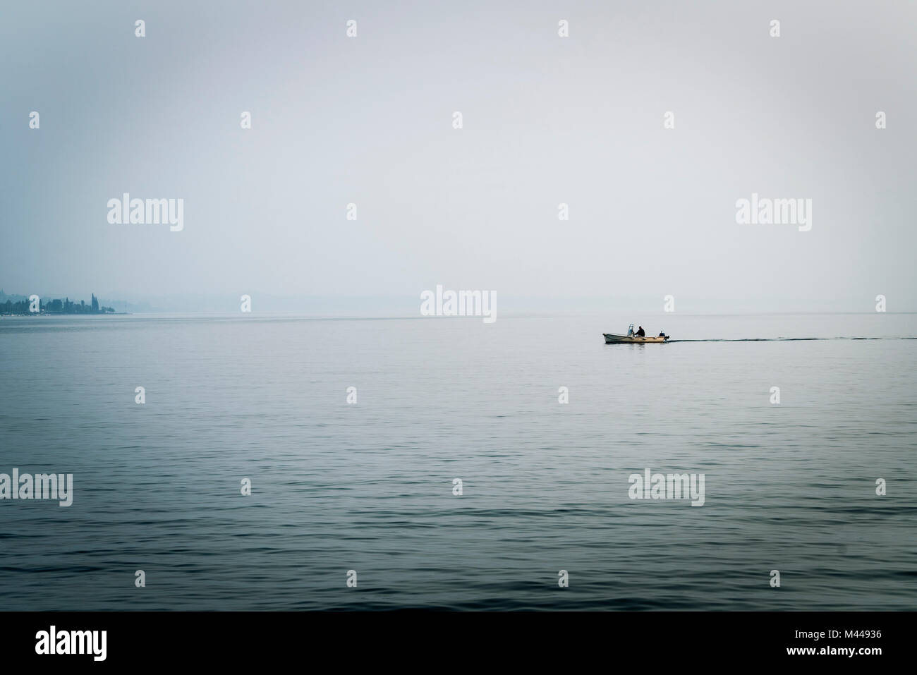 Distant boat hi-res stock photography and images - Alamy