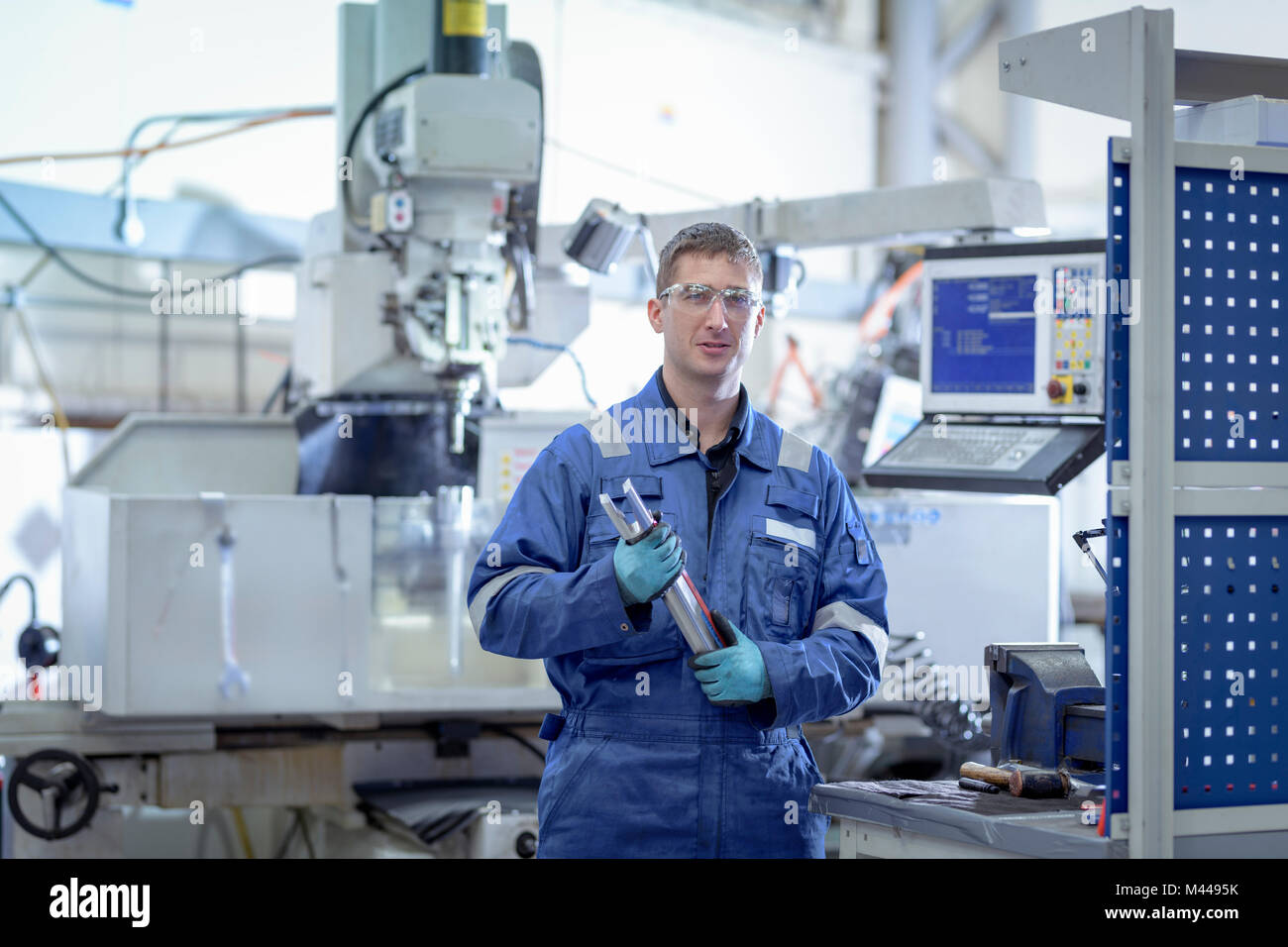 Portrait of engineer with lathe in turbine maintenance factory Stock ...