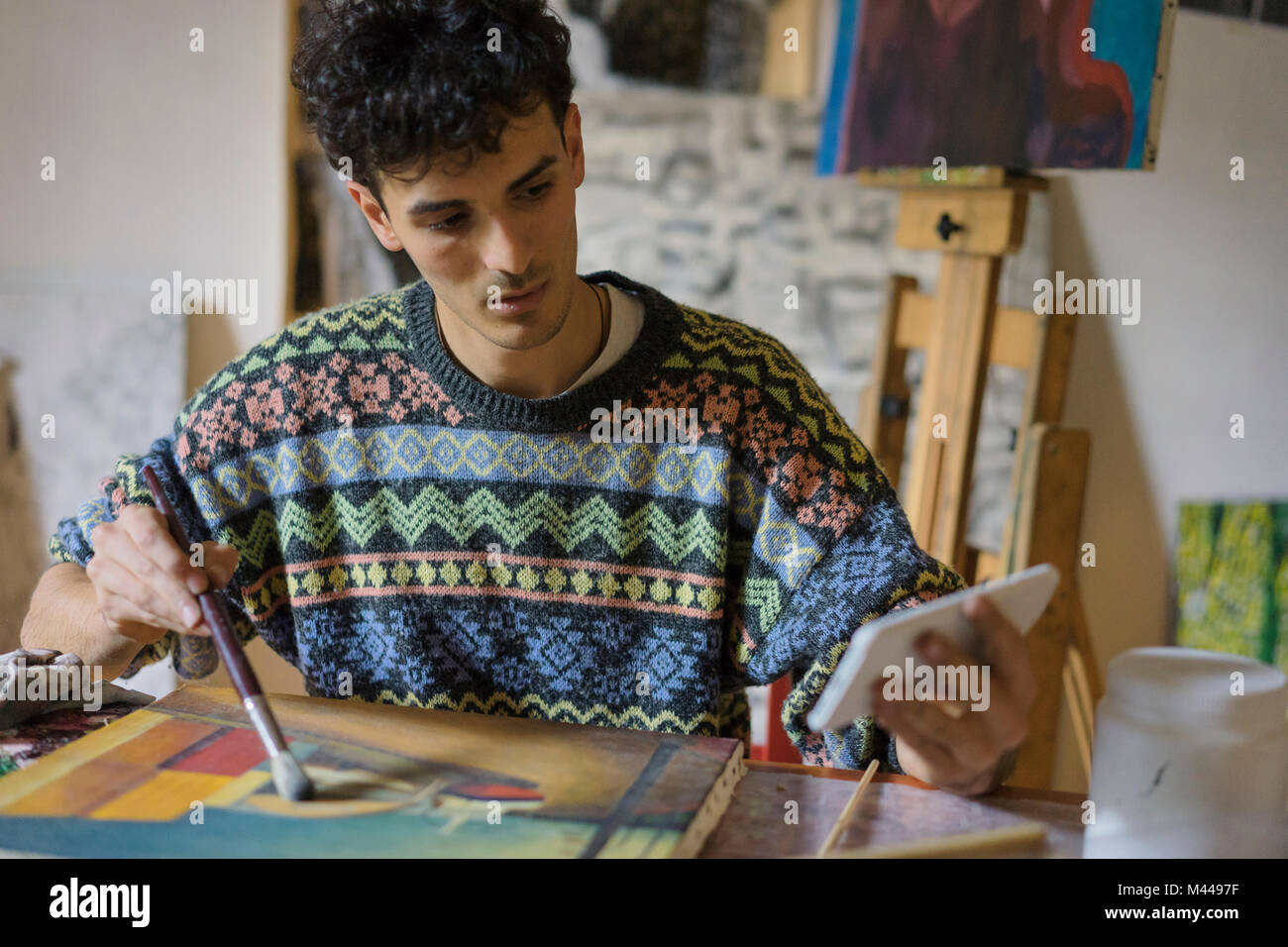 Looking at painting hi-res stock photography and images - Alamy